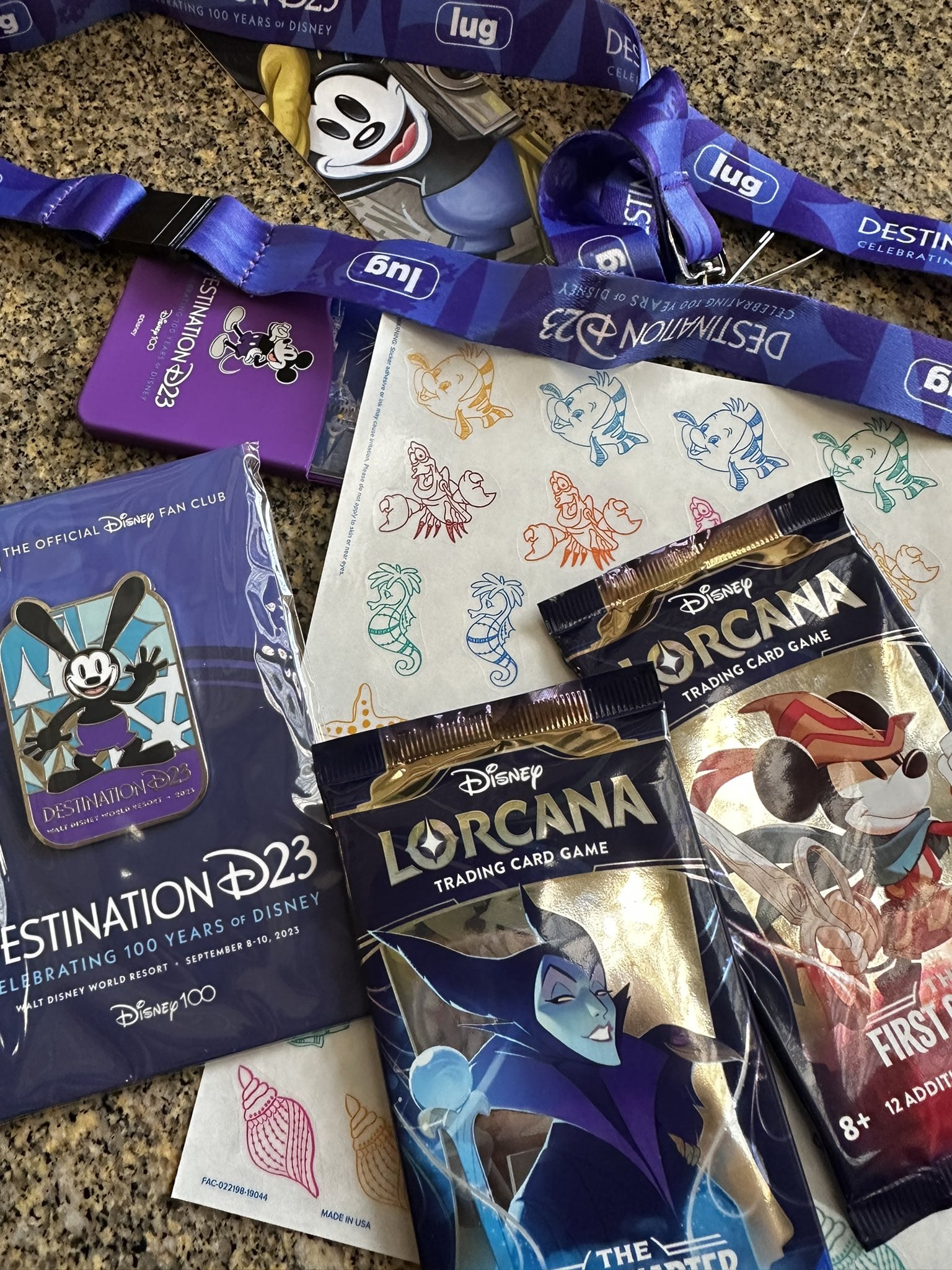 D23 2023 Gift Bag - Lorcana Pack - Mushu Report | Disney Lorcana News ...
